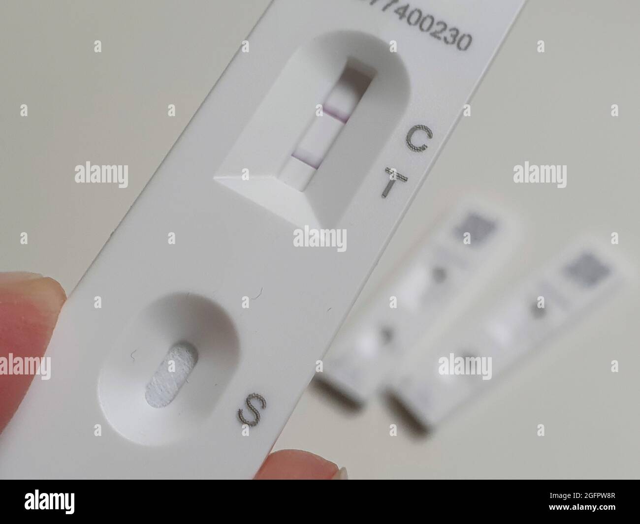 Sussex, UK, 26 August 2021: a positive lateral flow test shows a ...