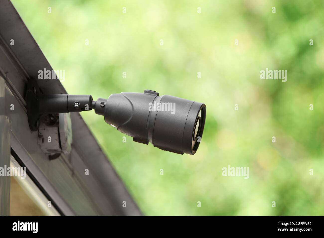 Security CCTV camera on street Stock Photo - Alamy