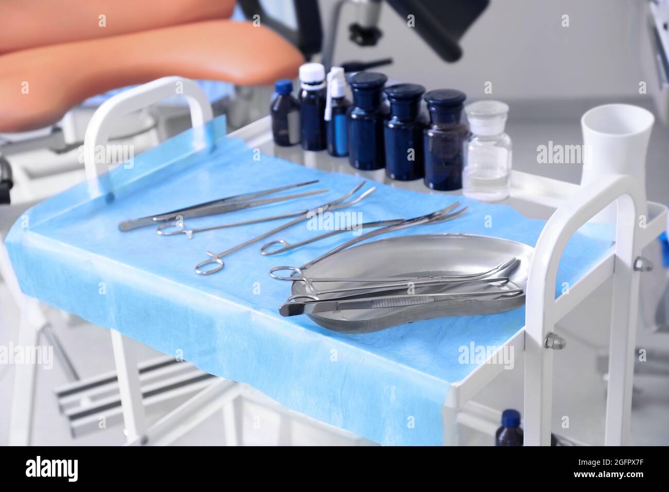 Gynecological tools on doctor's table in clinic Stock Photo - Alamy