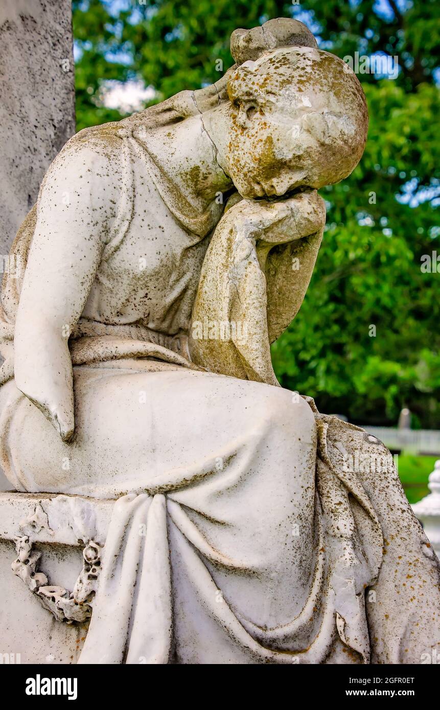 The Rouse family grave features a Neoclassical monument with a robed ...