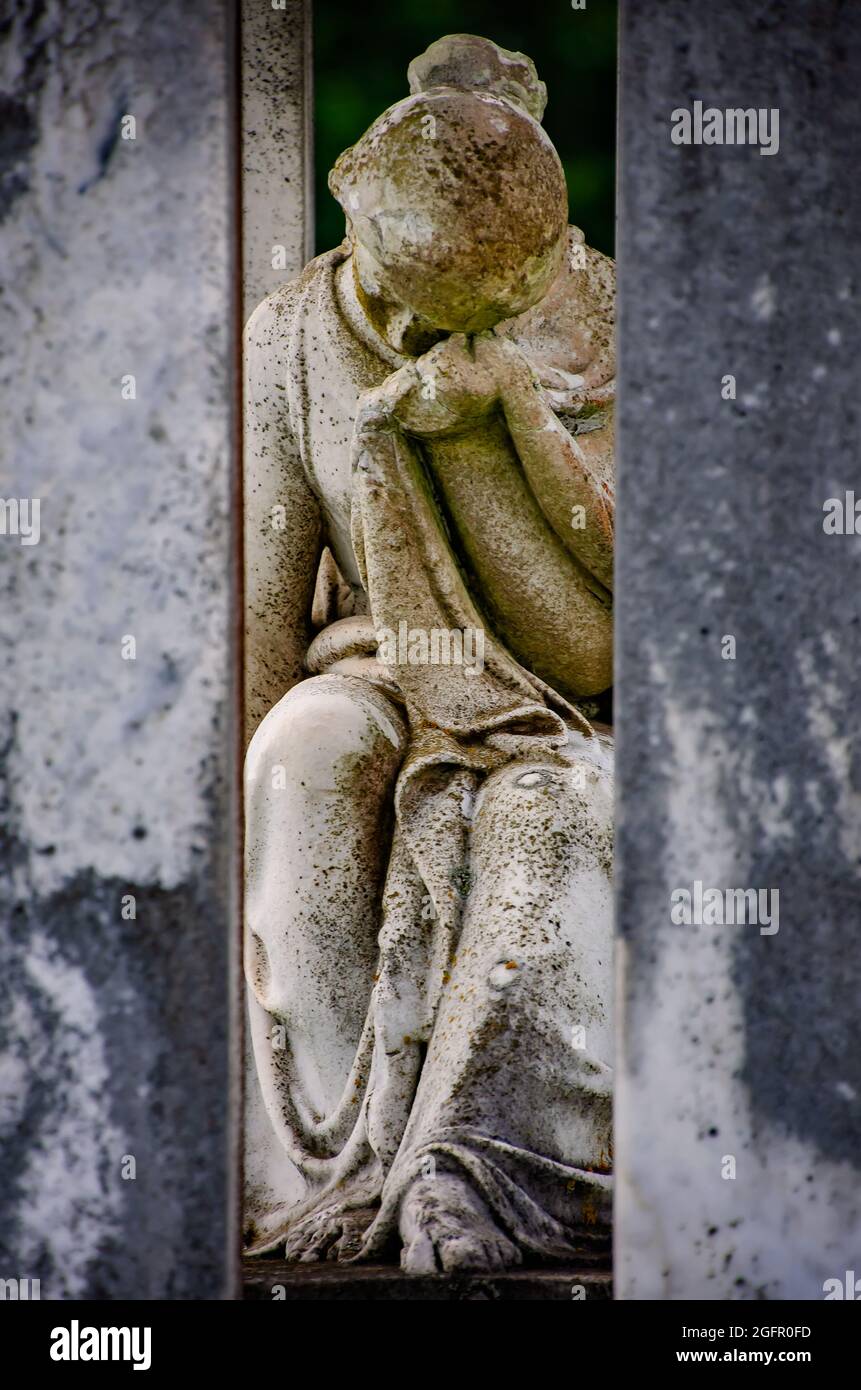The Rouse family grave features a Neoclassical monument with a robed ...