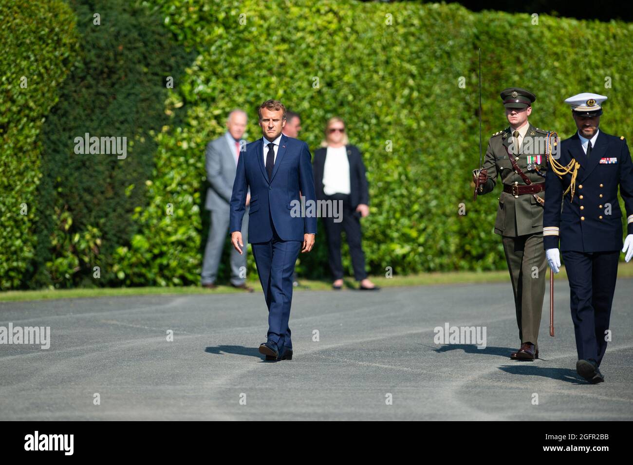 French President Emmanuel Macron review the Irish troops at Aras an ...