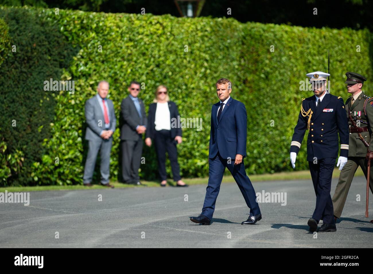 French President Emmanuel Macron review the Irish troops at Aras an ...
