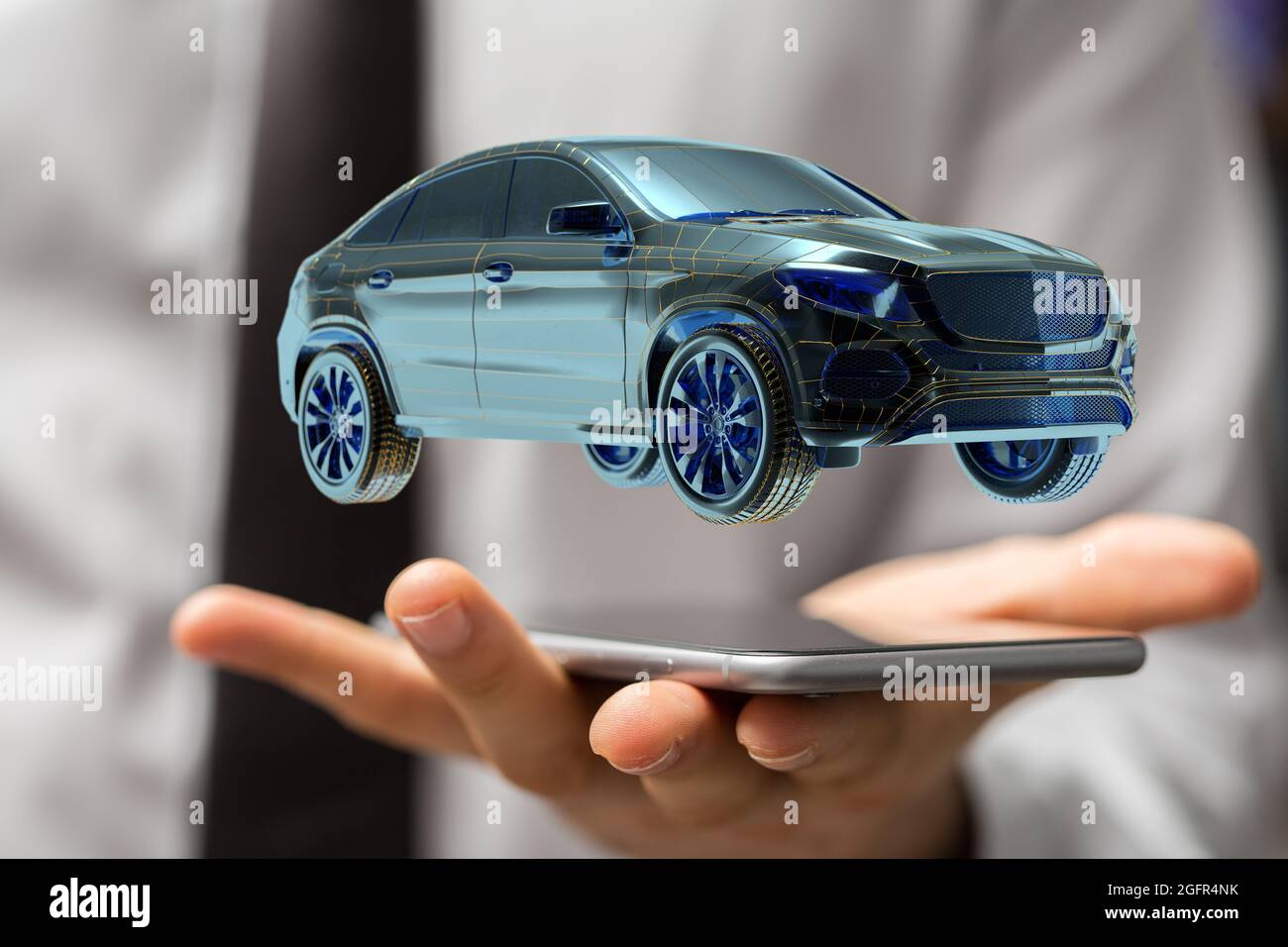 Person presenting the virtual projection of a futuristic polygonal car ...