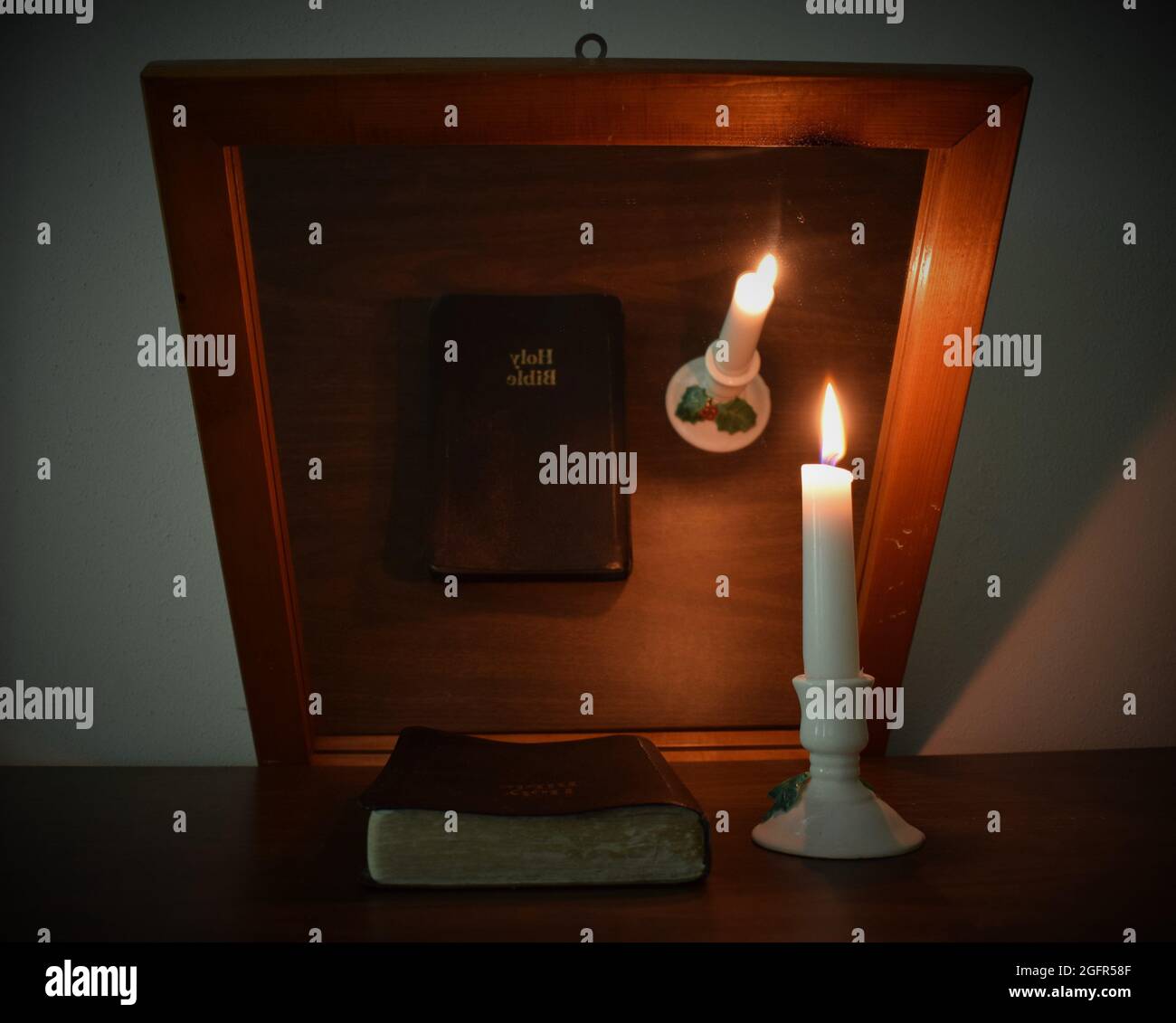 We see now in a mirror darkly Stock Photo - Alamy