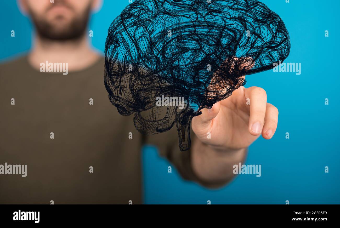 Person presenting the virtual projection of the human brain Stock Photo ...