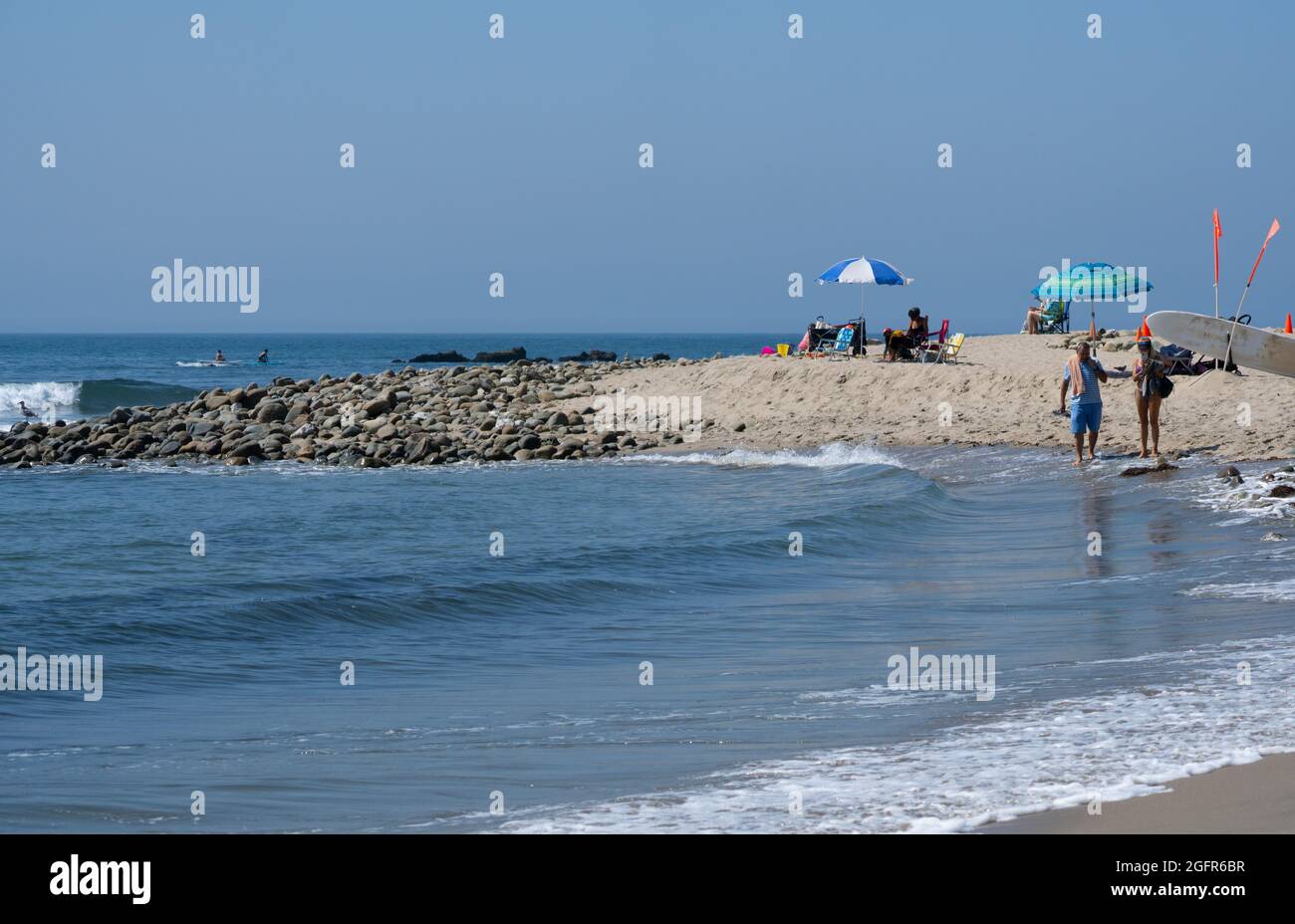 People sit and walk at Surfrider Beach in Malibu, California, USA Stock ...