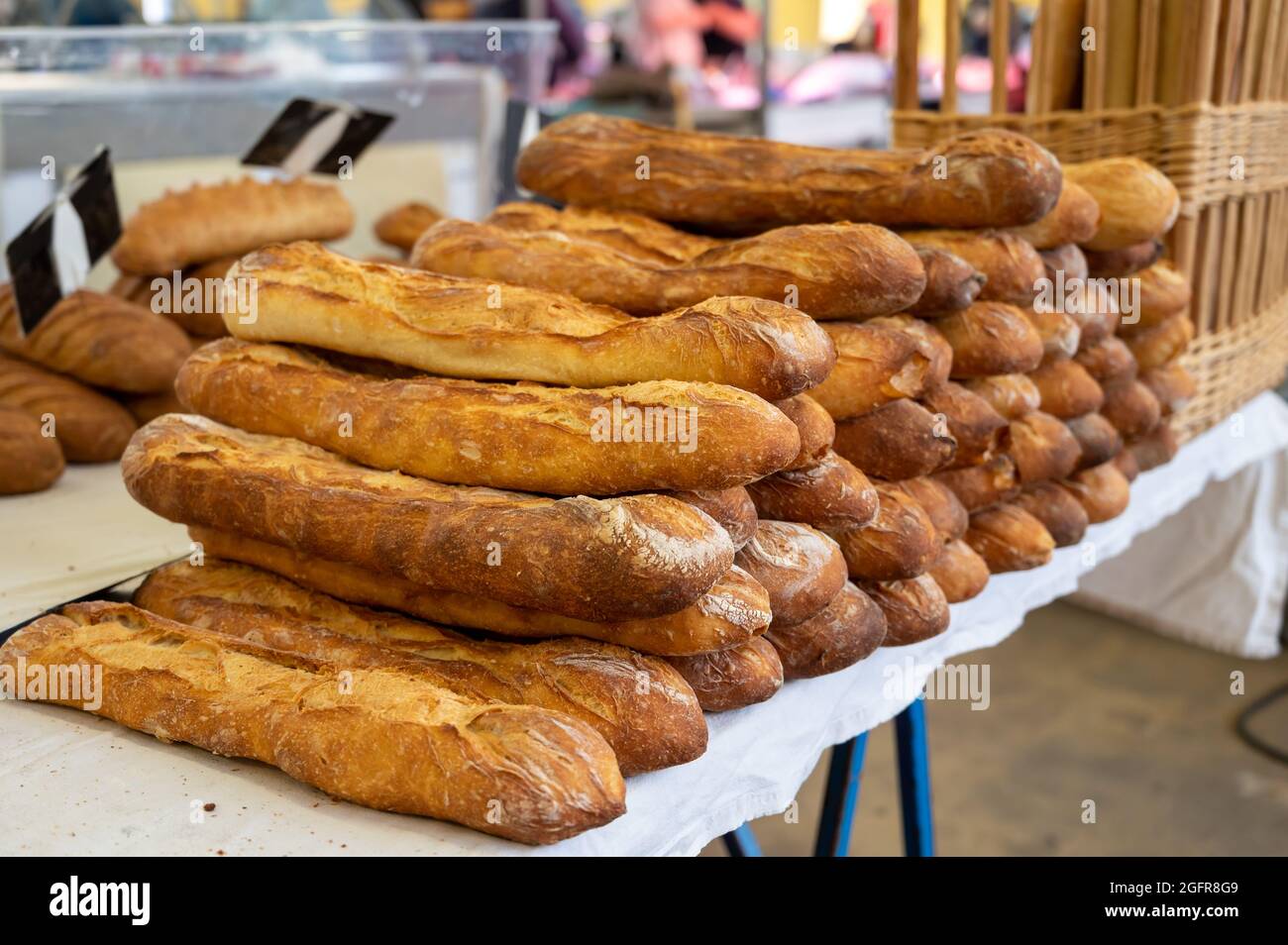 French bakery, many fresh baked baguettes breads ready for sale close ...