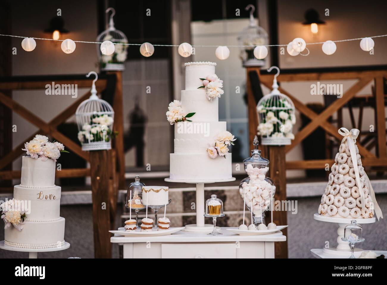 Corner with cakes and desserts for the wedding ceremony Stock Photo - Alamy