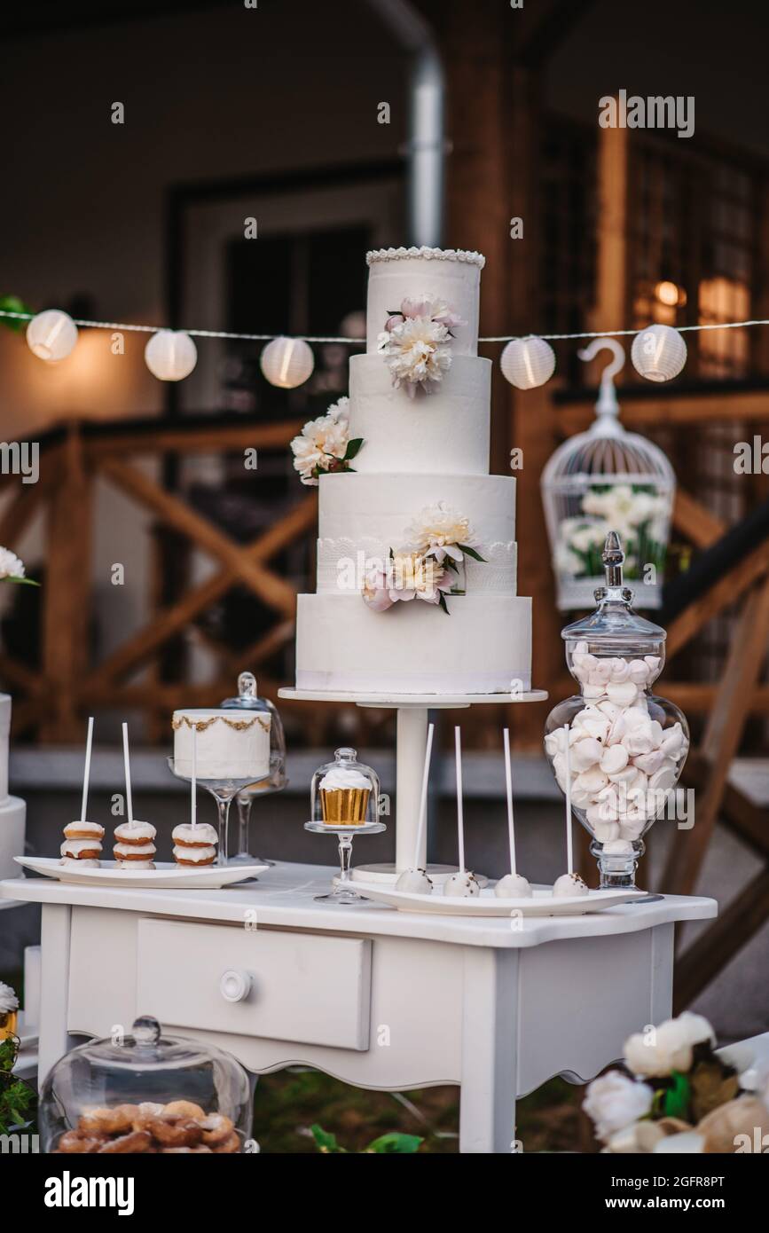 Corner with cakes and desserts for the wedding ceremony Stock Photo - Alamy