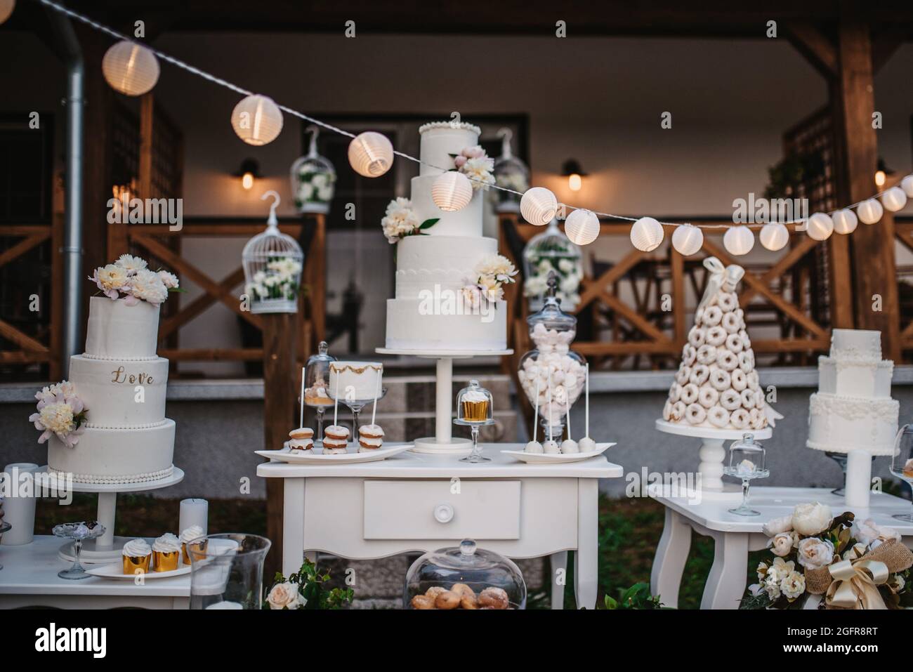 Corner with cakes and desserts for the wedding ceremony Stock Photo - Alamy