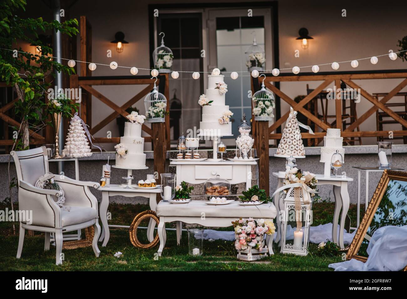 Corner with cakes and desserts for the wedding ceremony Stock Photo - Alamy