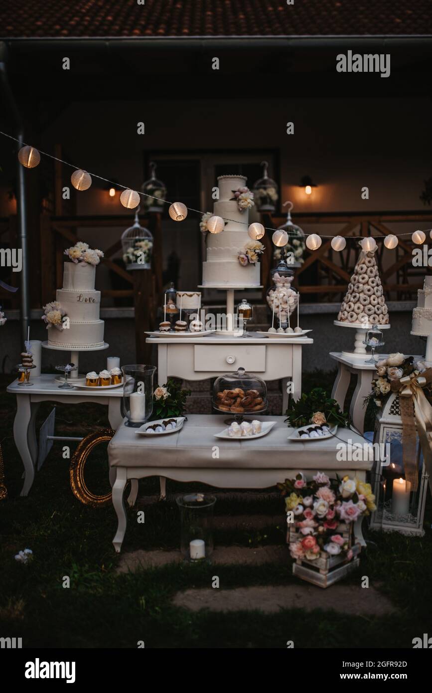 Corner with cakes and desserts for the wedding ceremony Stock Photo - Alamy