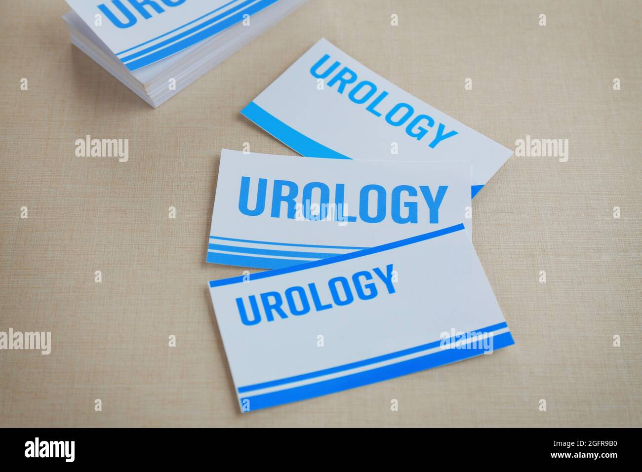 Cards with word UROLOGY on light background Stock Photo - Alamy
