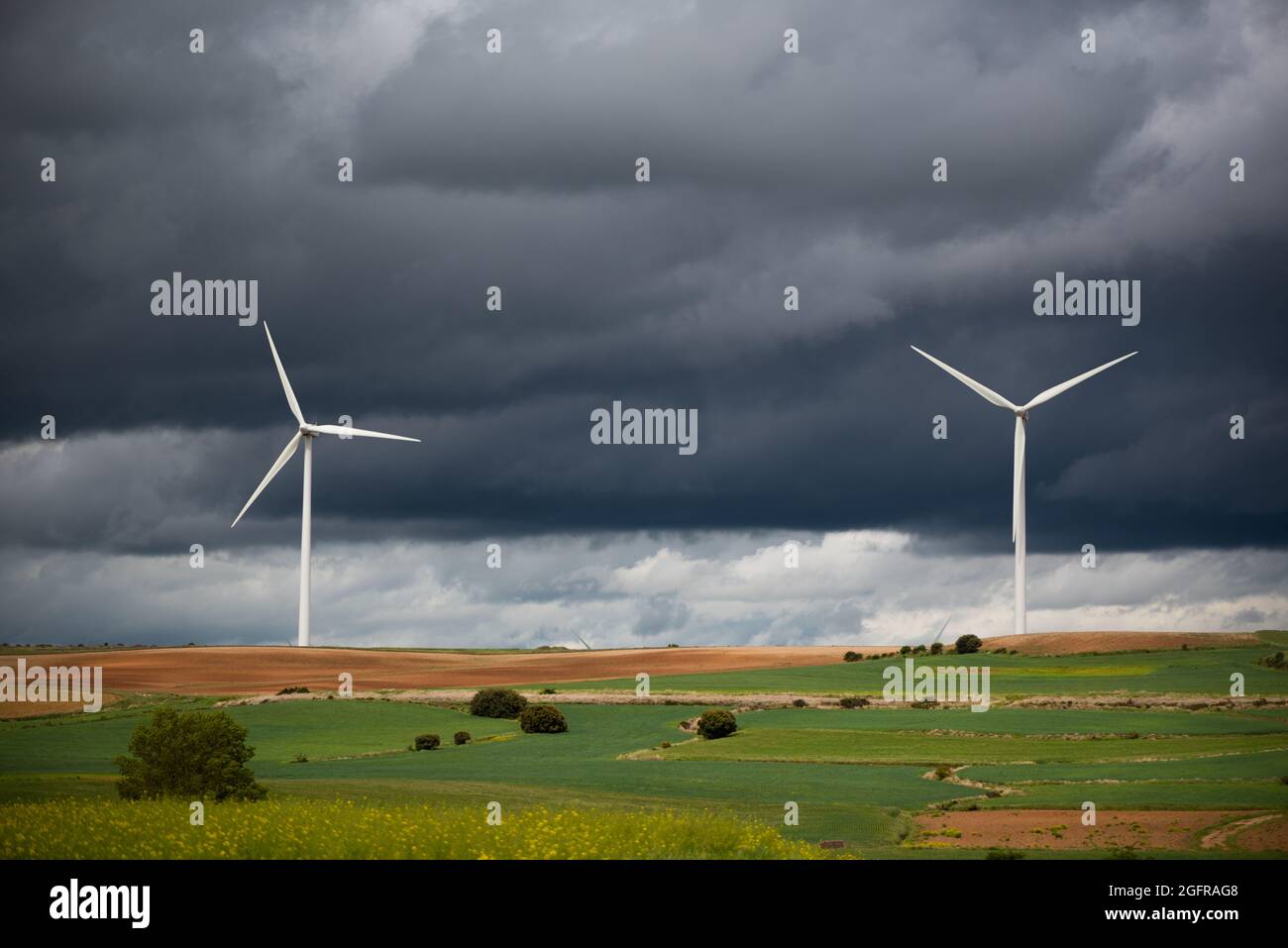 Wide Shot Of Renewable Wind Power Farm Windmills In Motion With A ...