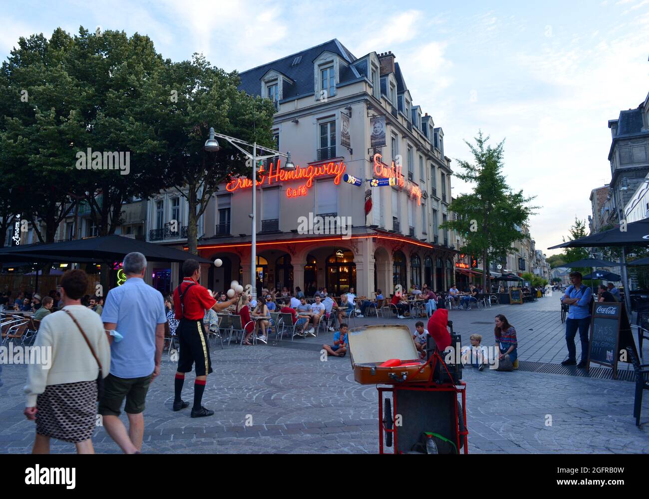 Reims, France, people watching a street artist in front of the Ernest ...