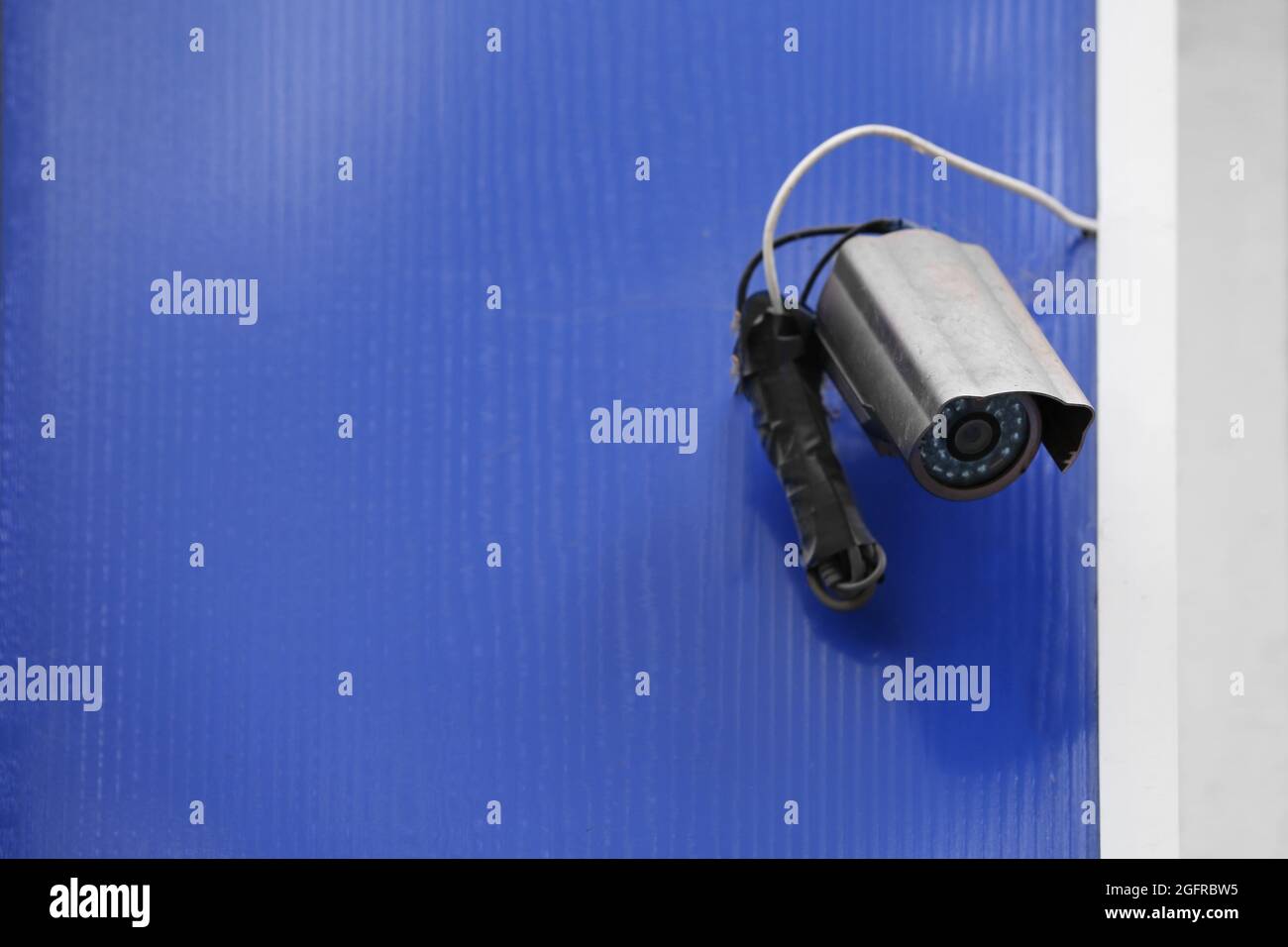 Security CCTV camera on street Stock Photo - Alamy