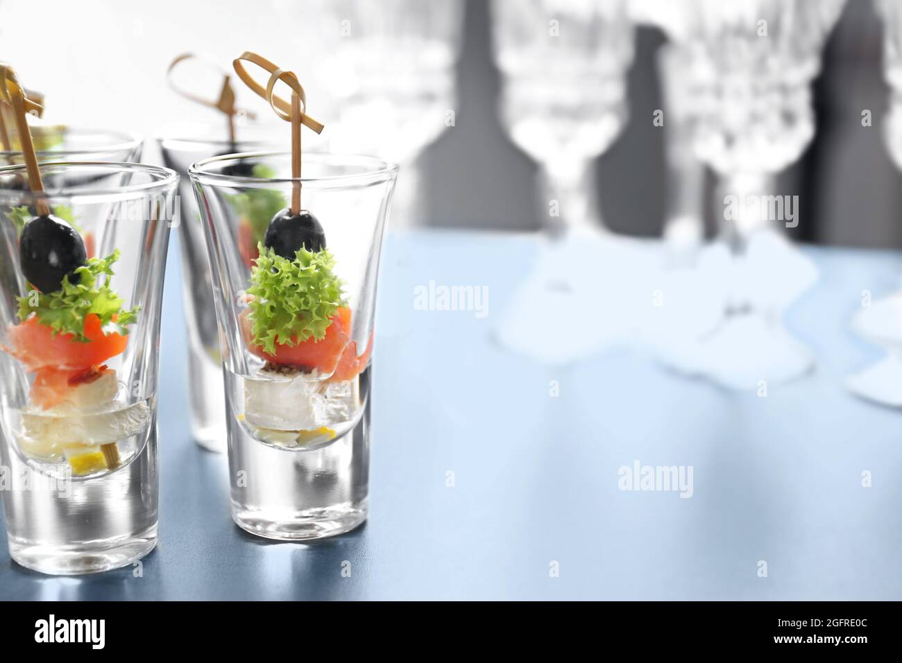 Fresh tasty canapes on table Stock Photo - Alamy