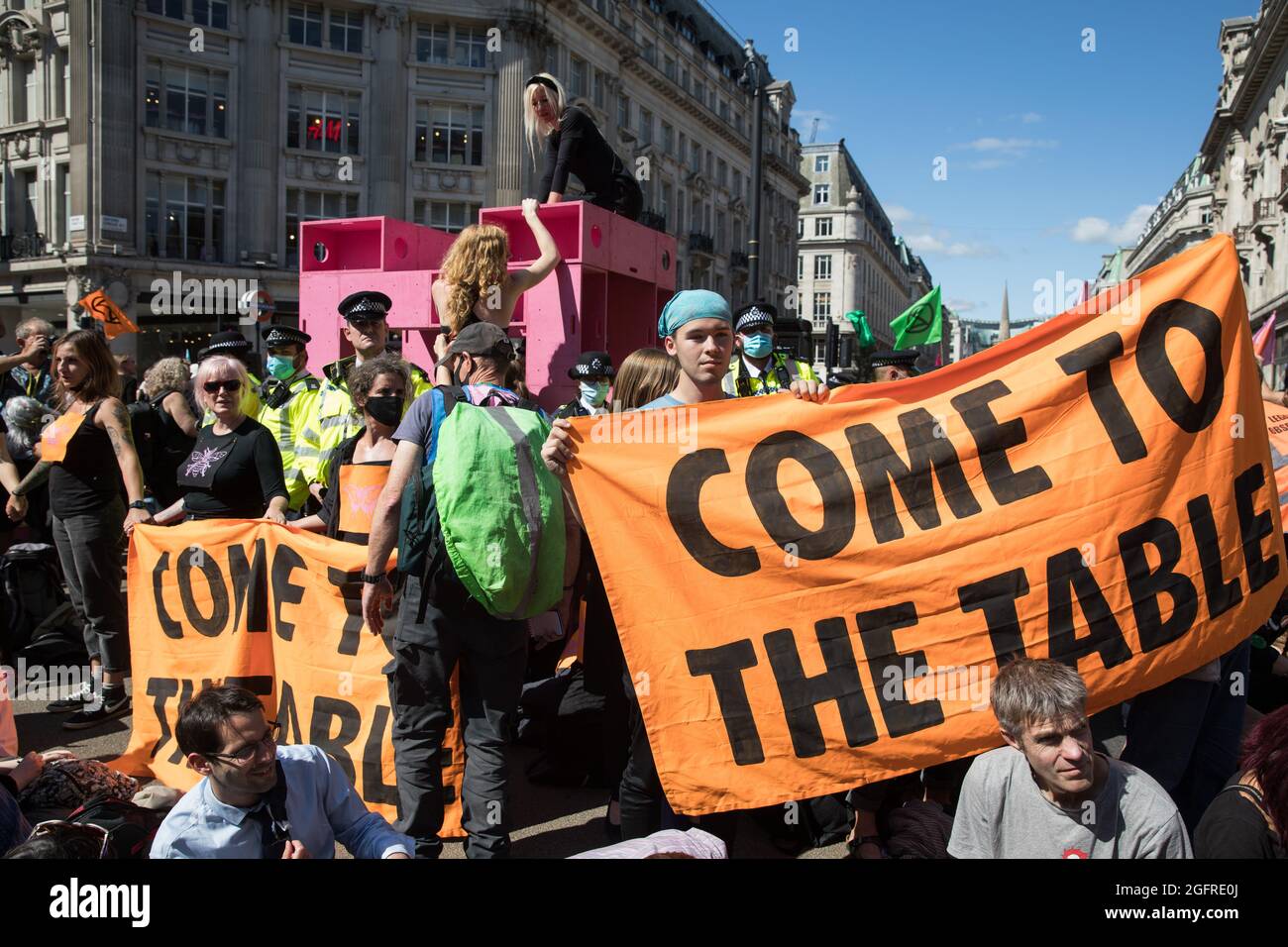 London, UK. 25th August, 2021. Women and FINT-identifying environmental ...
