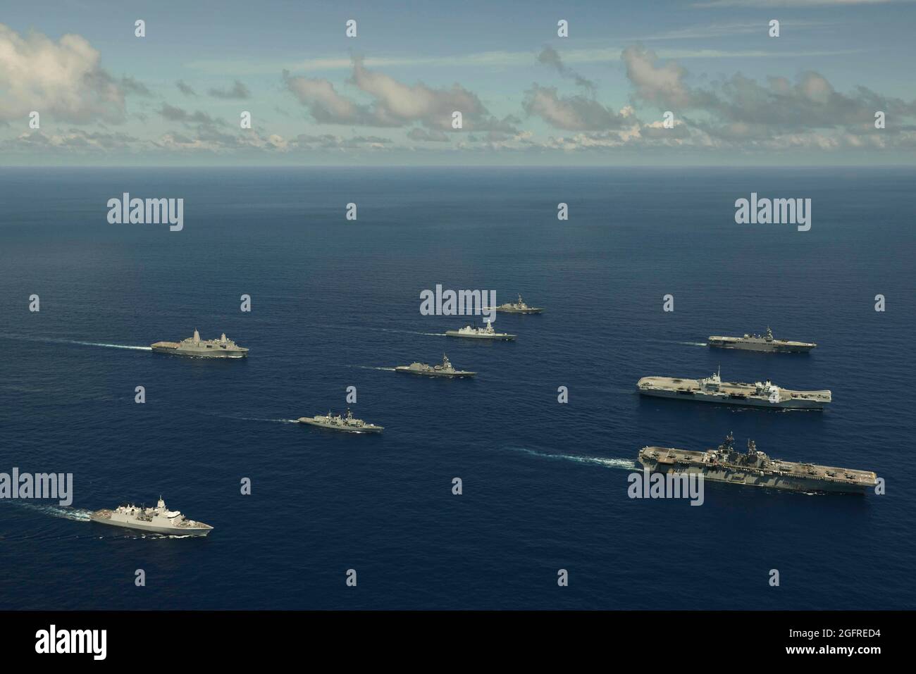 United Kingdom (U.K.) Carrier Strike Group (CSG 21) and USS America ...