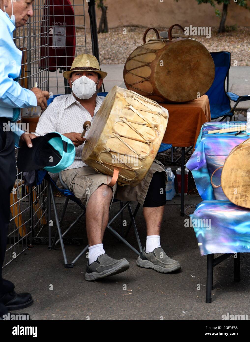 Cochiti Pueblo artist Theodore Herrera sells his handmade drums at the ...