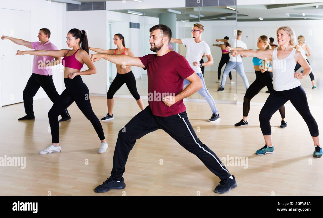 active men and ladies dancing aerobics at lesson Stock Photo - Alamy
