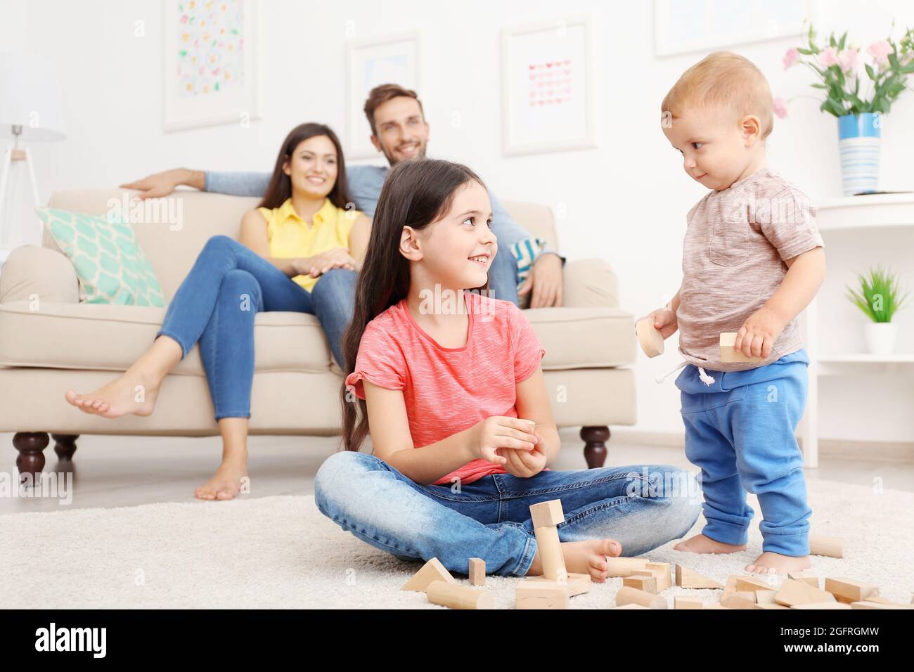 Cute kids playing games at home Stock Photo - Alamy