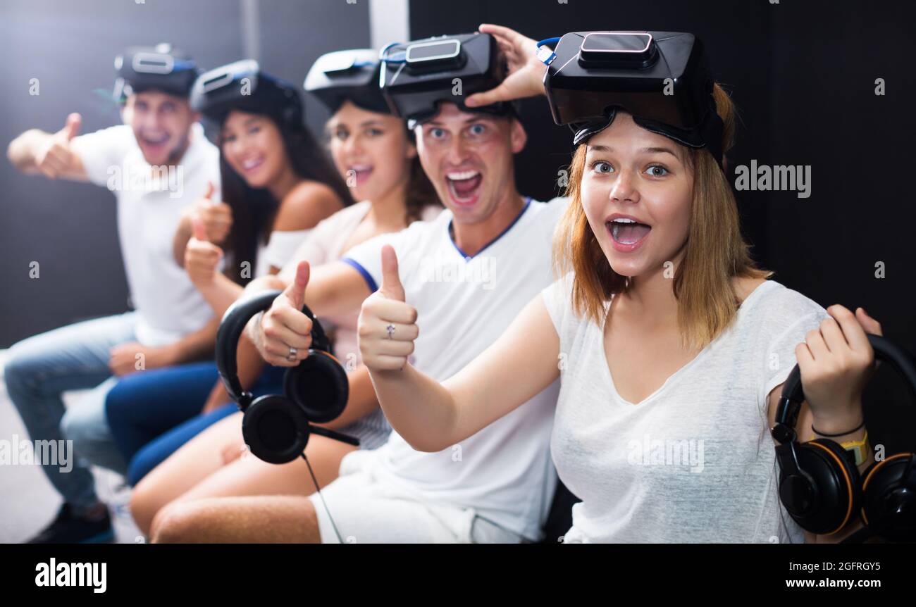 People expressing satisfaction with vr attraction Stock Photo - Alamy