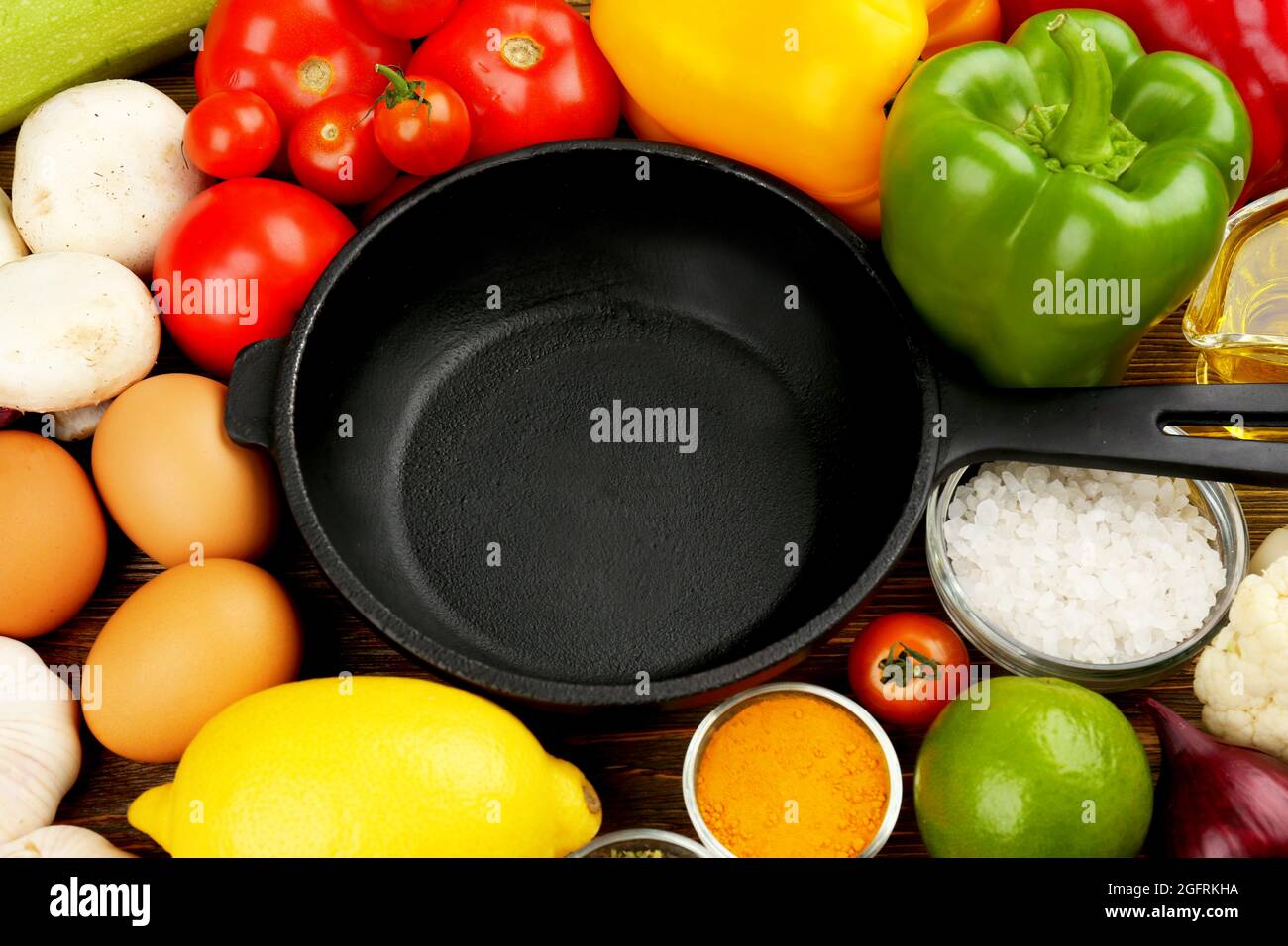 Frying pan with fresh ingredients Stock Photo - Alamy