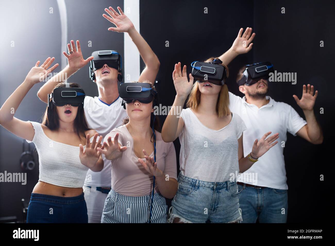 Adults posing in quest room Stock Photo - Alamy