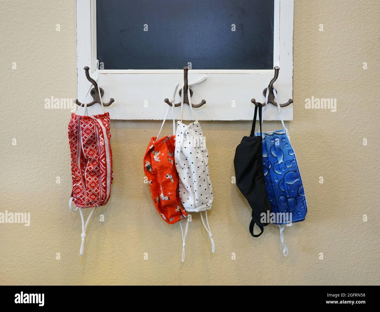 Rack of masks hi-res stock photography and images - Alamy