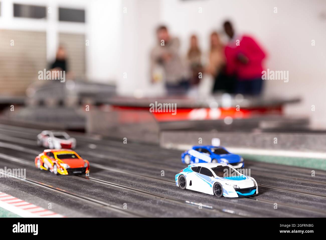 Models of race cars on track Stock Photo - Alamy