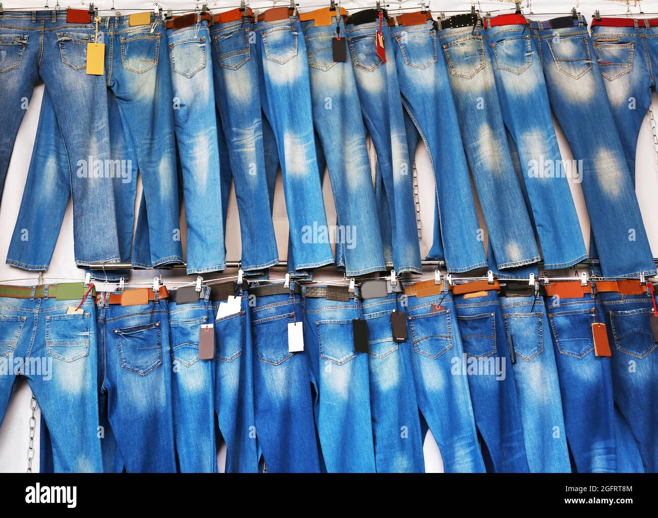 Denim clothes in clothing store Stock Photo - Alamy
