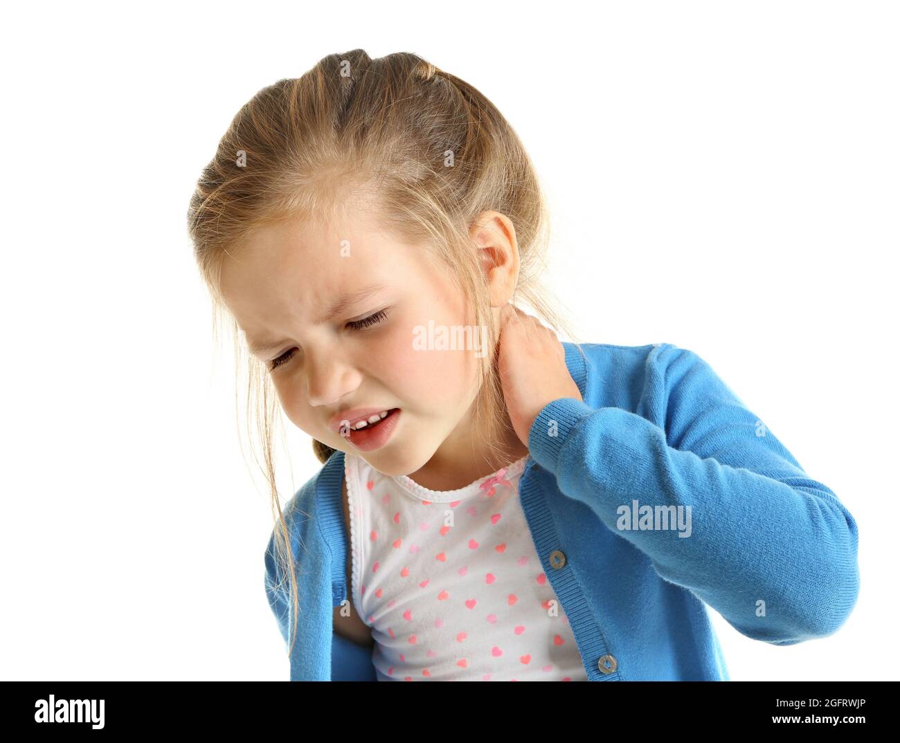Cute little girl having neck pain, isolated on white Stock Photo - Alamy