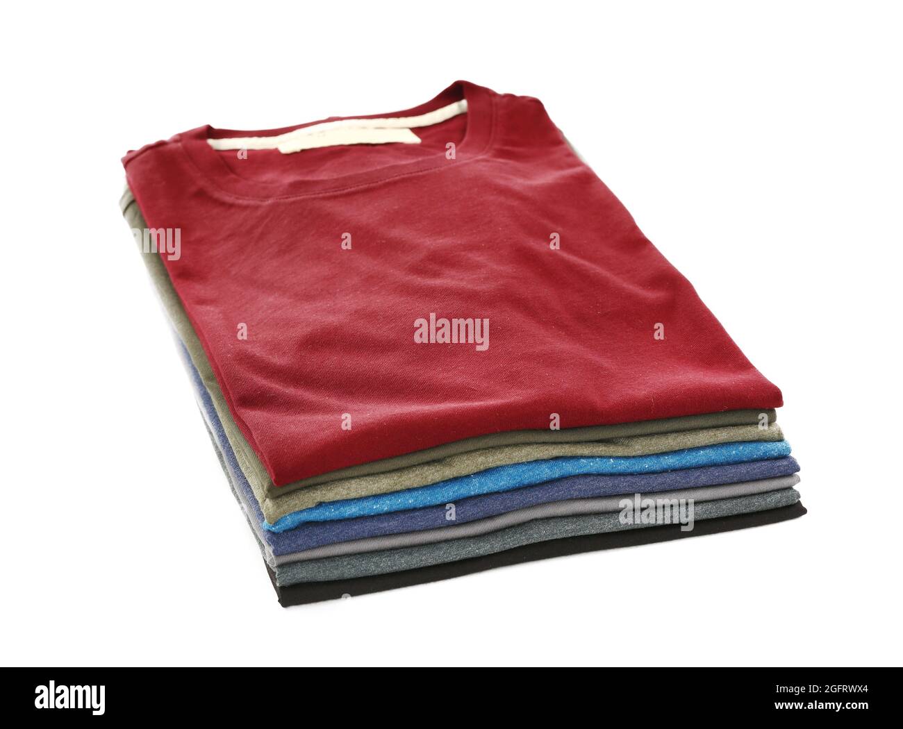 Stack of colorful t-shirts on white background Stock Photo - Alamy