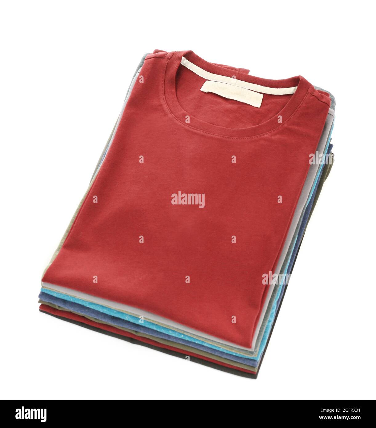 Stack of colorful t-shirts on white background Stock Photo - Alamy