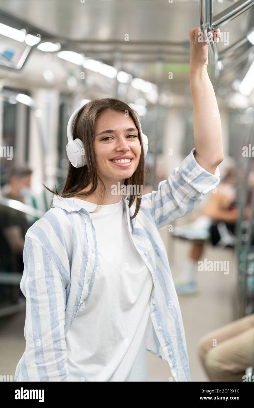 Listen to music subway hi-res stock photography and images - Alamy