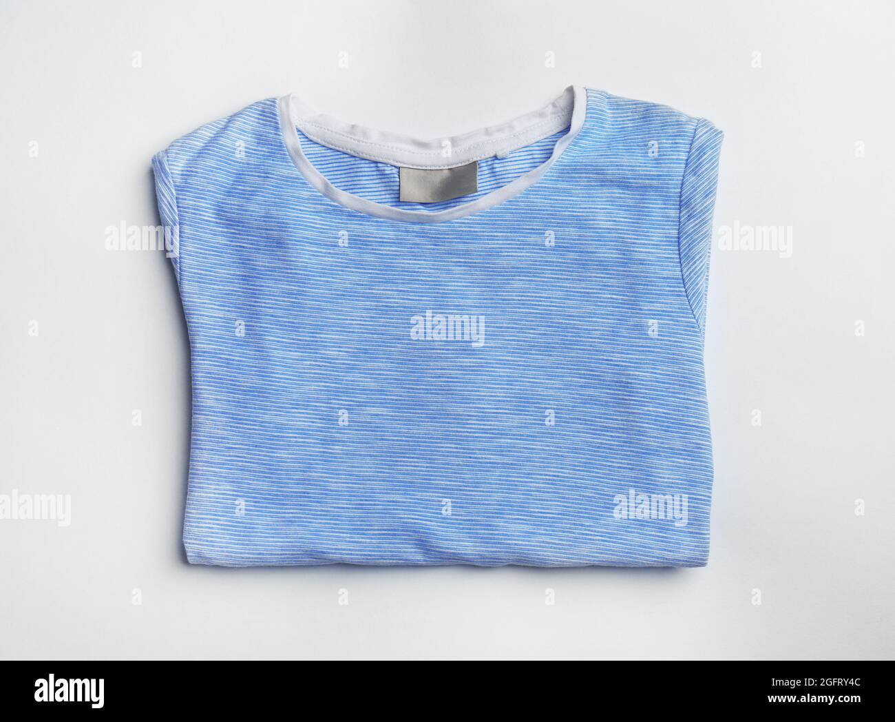 Blank color t-shirt on white background Stock Photo - Alamy
