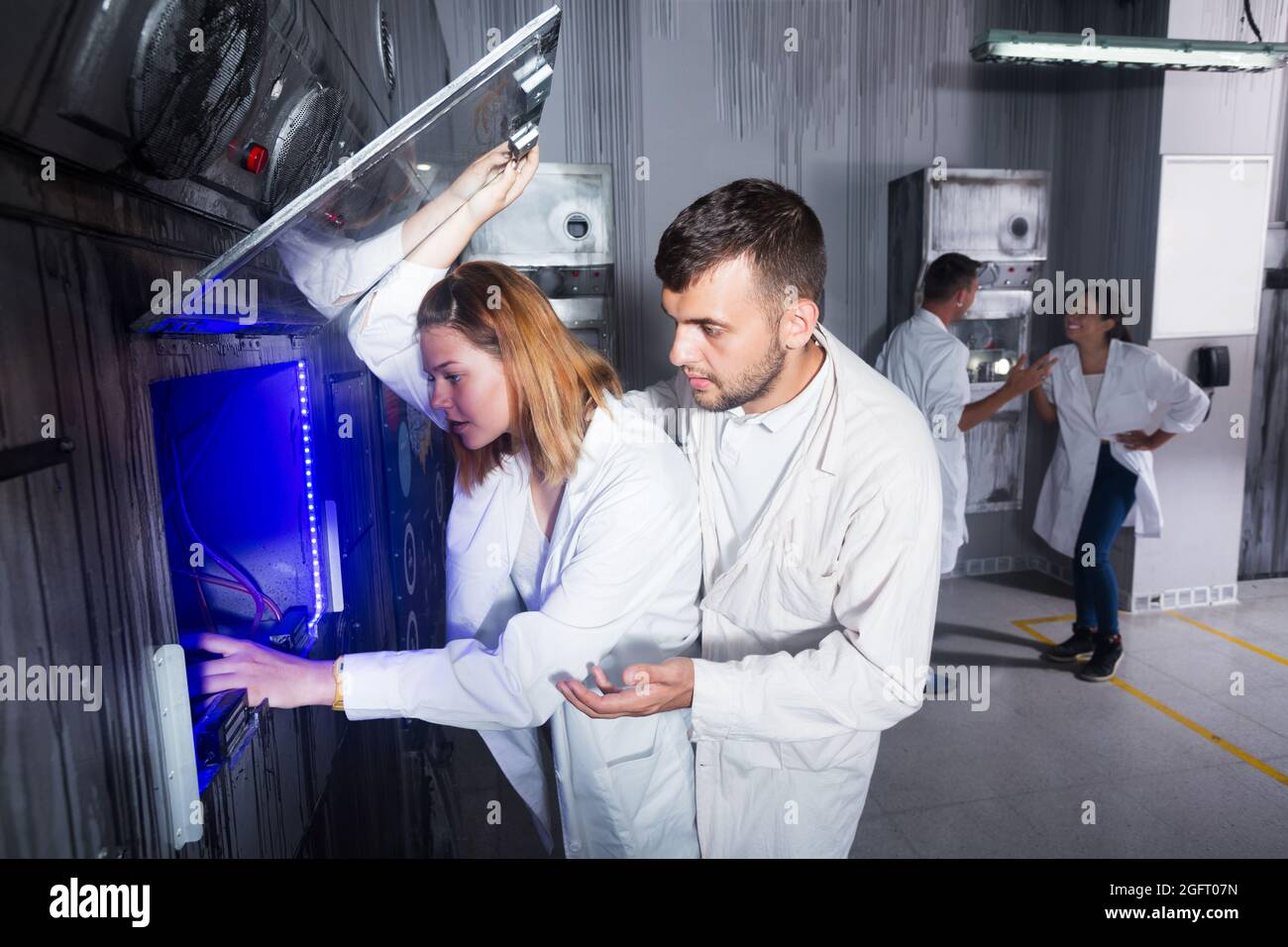 Adults in quest room Stock Photo - Alamy
