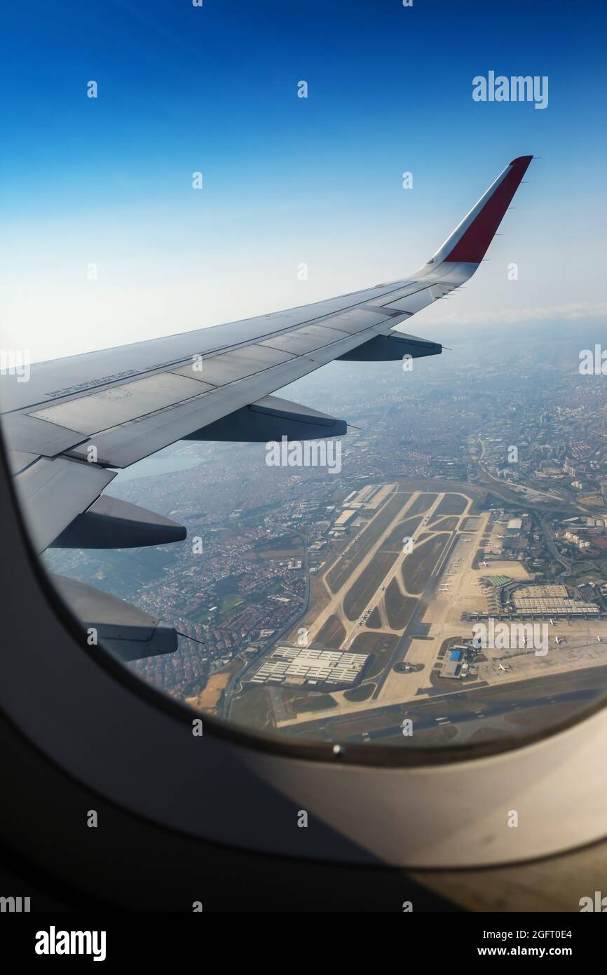 Looking through window aircraft during flight in wing lands over ...