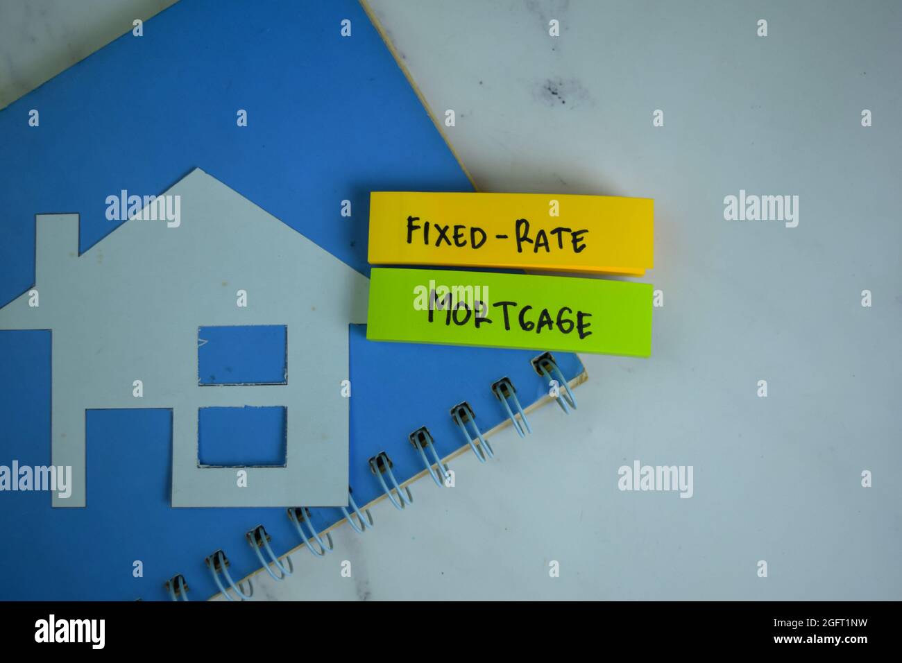 Fixed-Rate Mortgage write on sticky notes isolated on Wooden Table ...