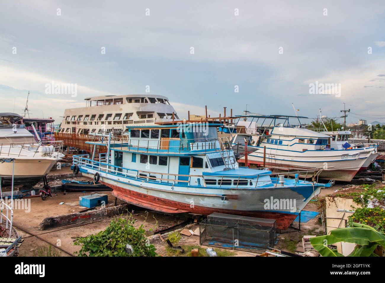 Ship scrap yard or scrapping site for old boats Stock Photo - Alamy