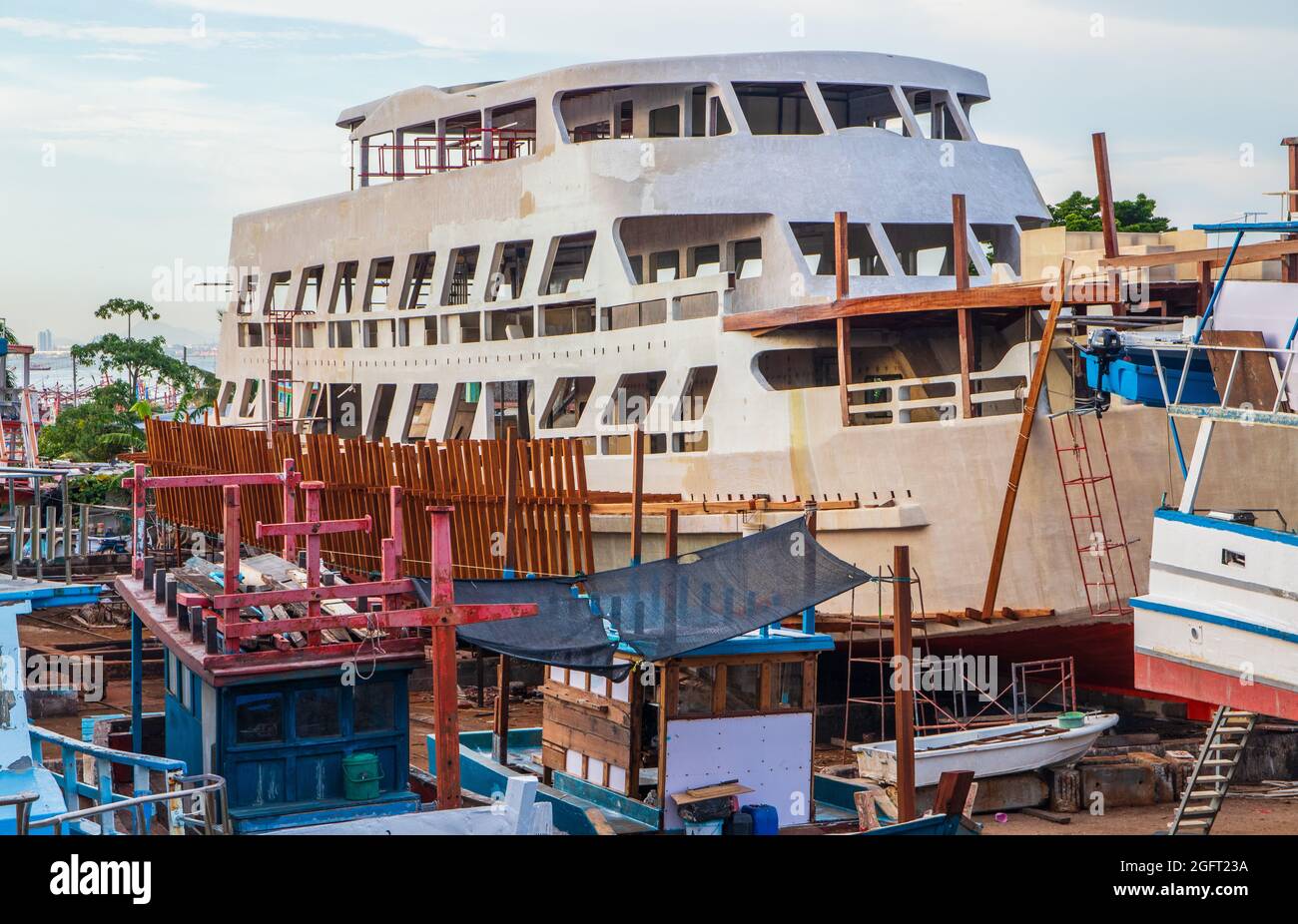 Ship scrap yard or scrapping site for old boats Stock Photo - Alamy