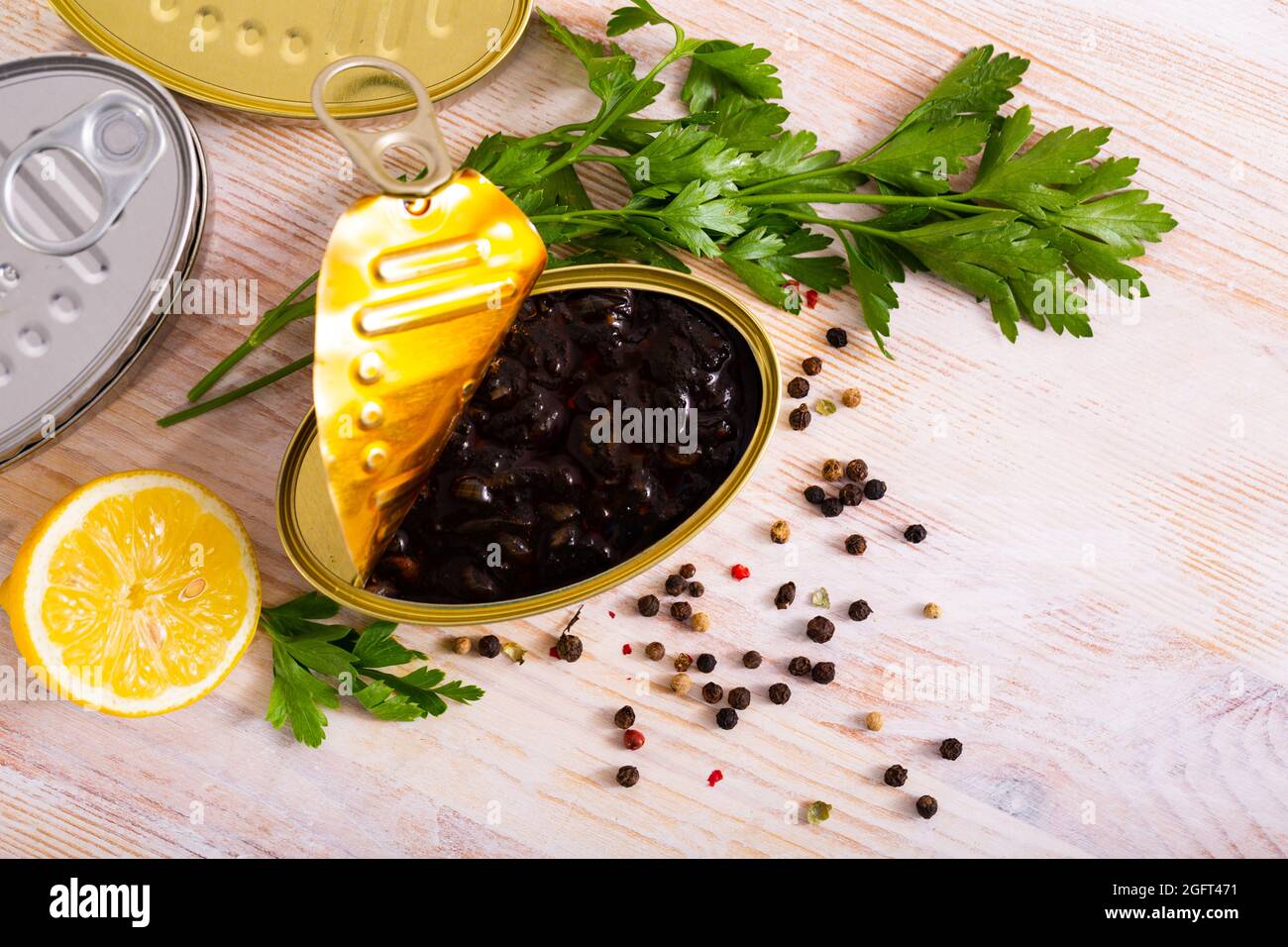 Calamari in ink Stock Photo - Alamy