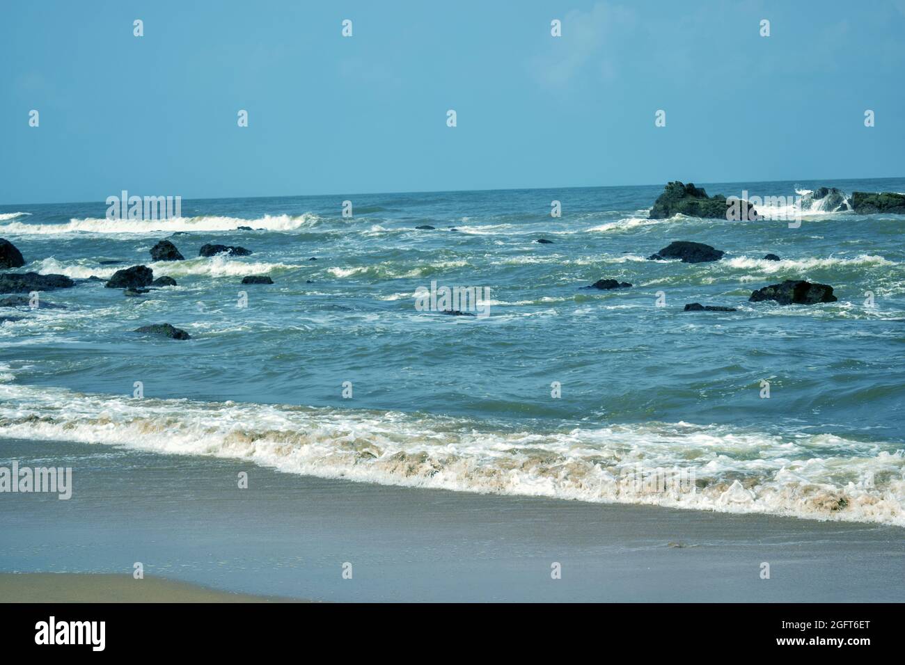 Ocean-Sea Waves, Rock stones and Sky Blue Landscape Background Stock ...