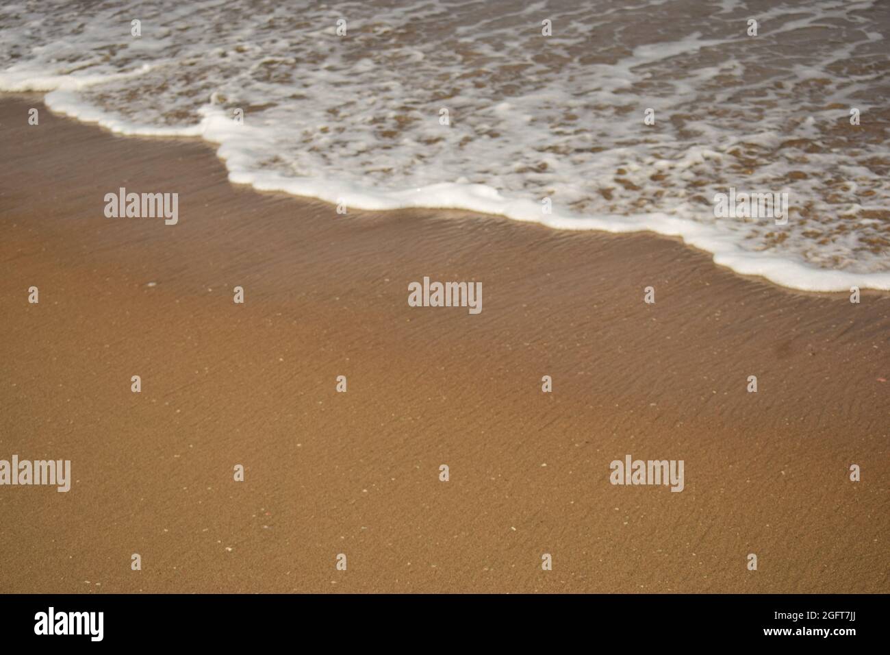 Ocean-Sea Waves Beach Sand and Mountains Yellow Landscape Background ...
