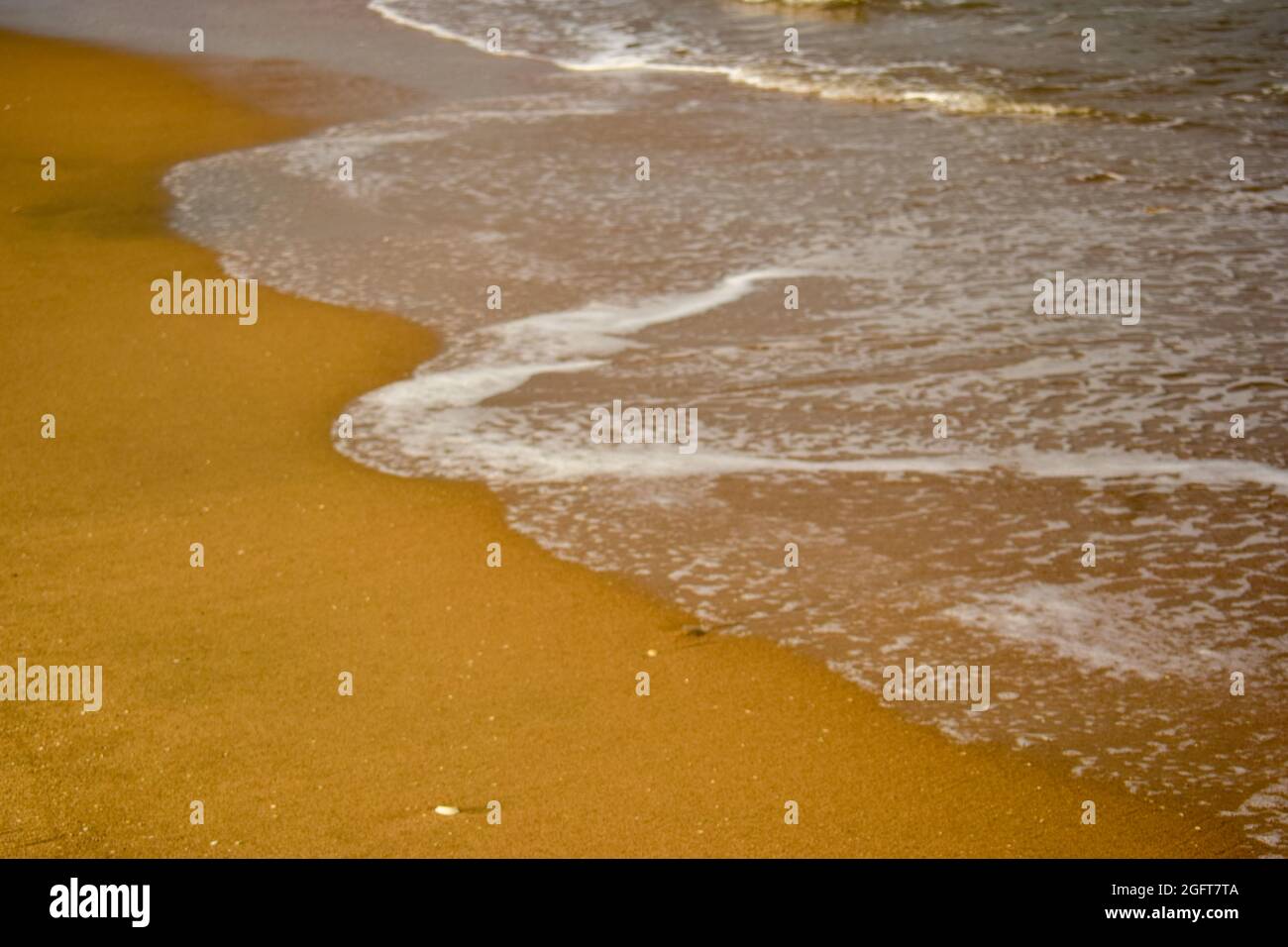 Ocean-Sea Waves Beach Sand and Mountains Yellow Landscape Background ...