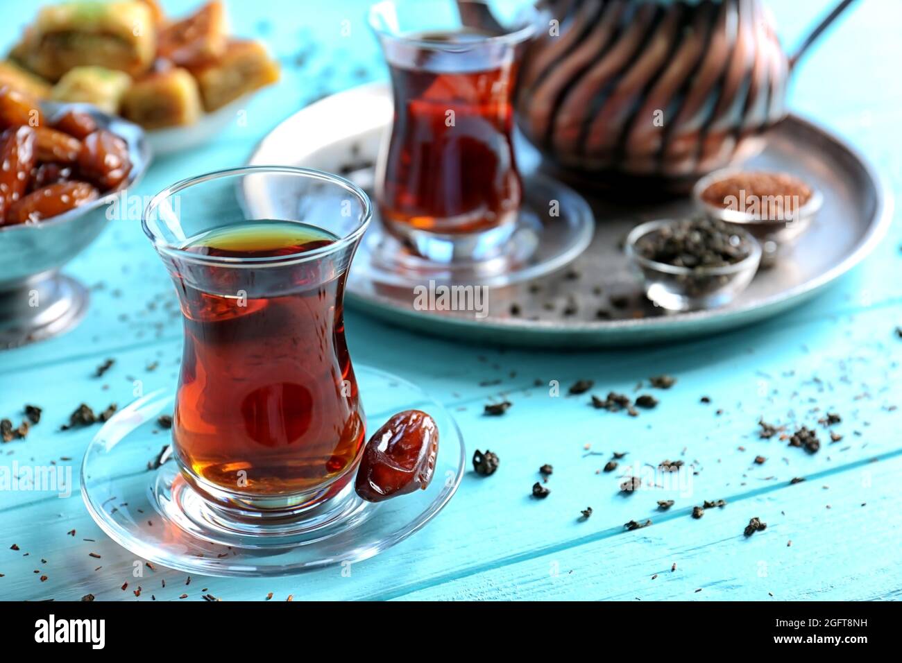 Turkish tea in traditional glass on wooden background Stock Photo - Alamy