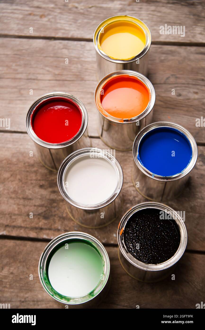Presentation of a series of cans of paint of various colors Stock Photo ...