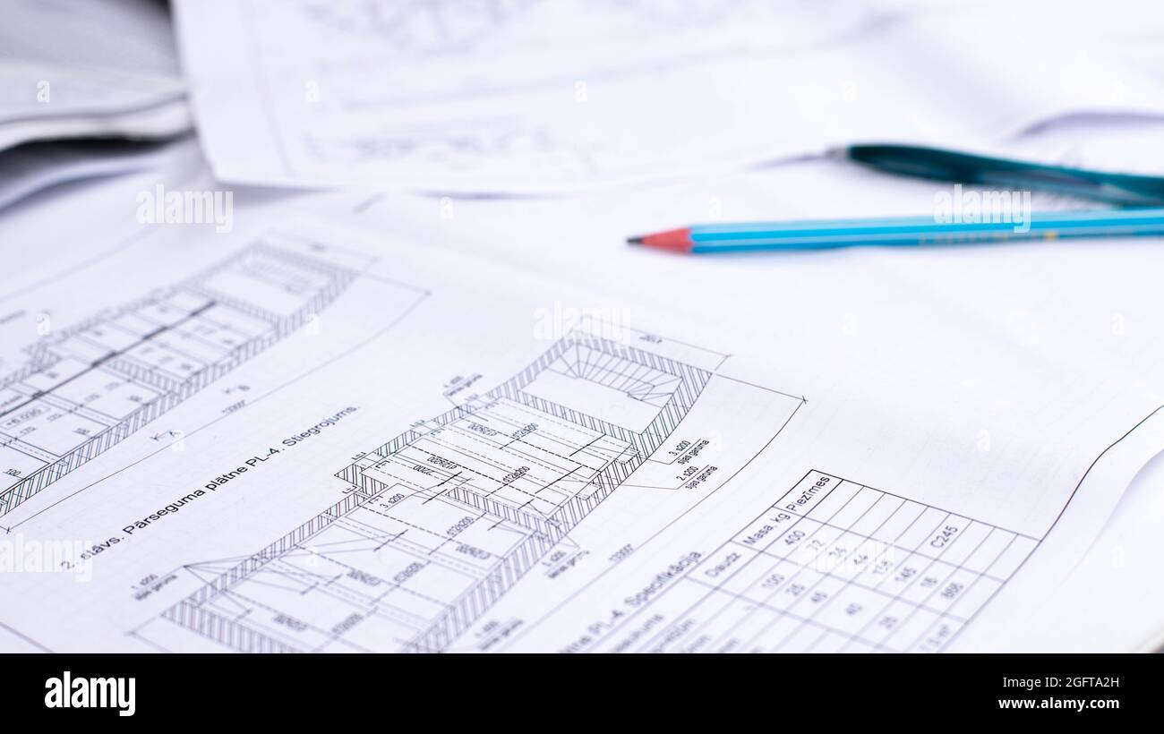 drawings of a construction engineer on a sheet of paper Stock Photo - Alamy